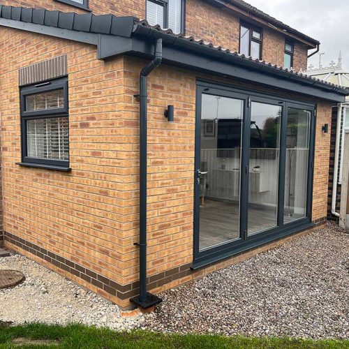 Extension with bifold door and two roof windows - Acorn Windows