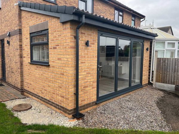 Extension with bifold door and two roof windows - Acorn Windows