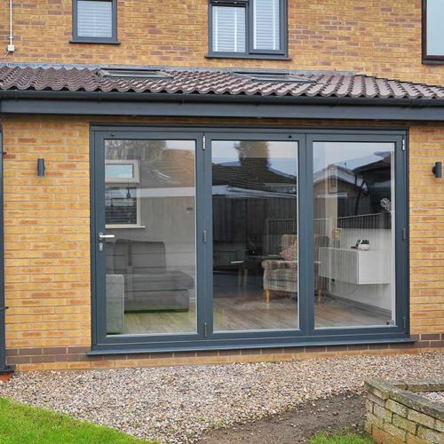 Extension with bifold door and two roof windows - Acorn Windows