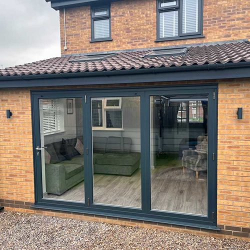 Extension with bifold door and two roof windows - Acorn Windows